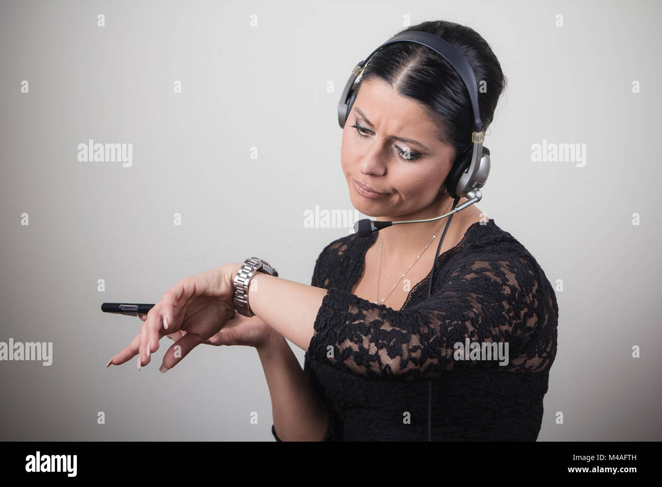 Bored customer service agent Stock Photo - Alamy