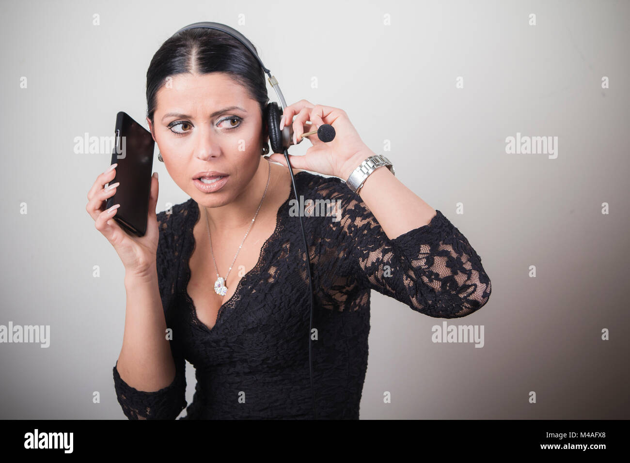 Bored customer service agent Stock Photo - Alamy