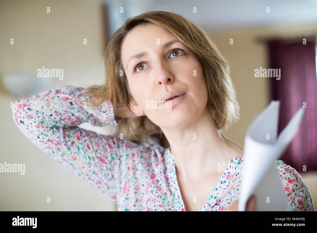 Mature Woman Experiencing Hot Flush From Menopause Stock Photo - Alamy