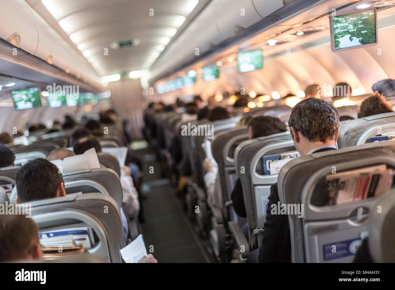 Passengers crowded economy hi-res stock photography and images - Alamy