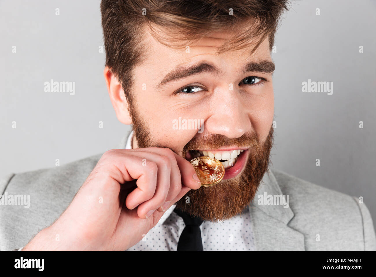 Biting Gold Coin High Resolution Stock Photography and Images - Alamy