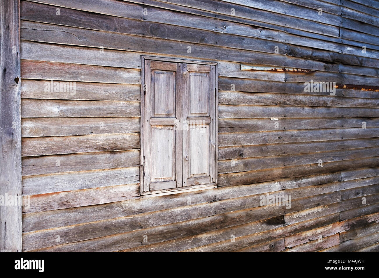 Rural wood wall and window Stock Photo - Alamy