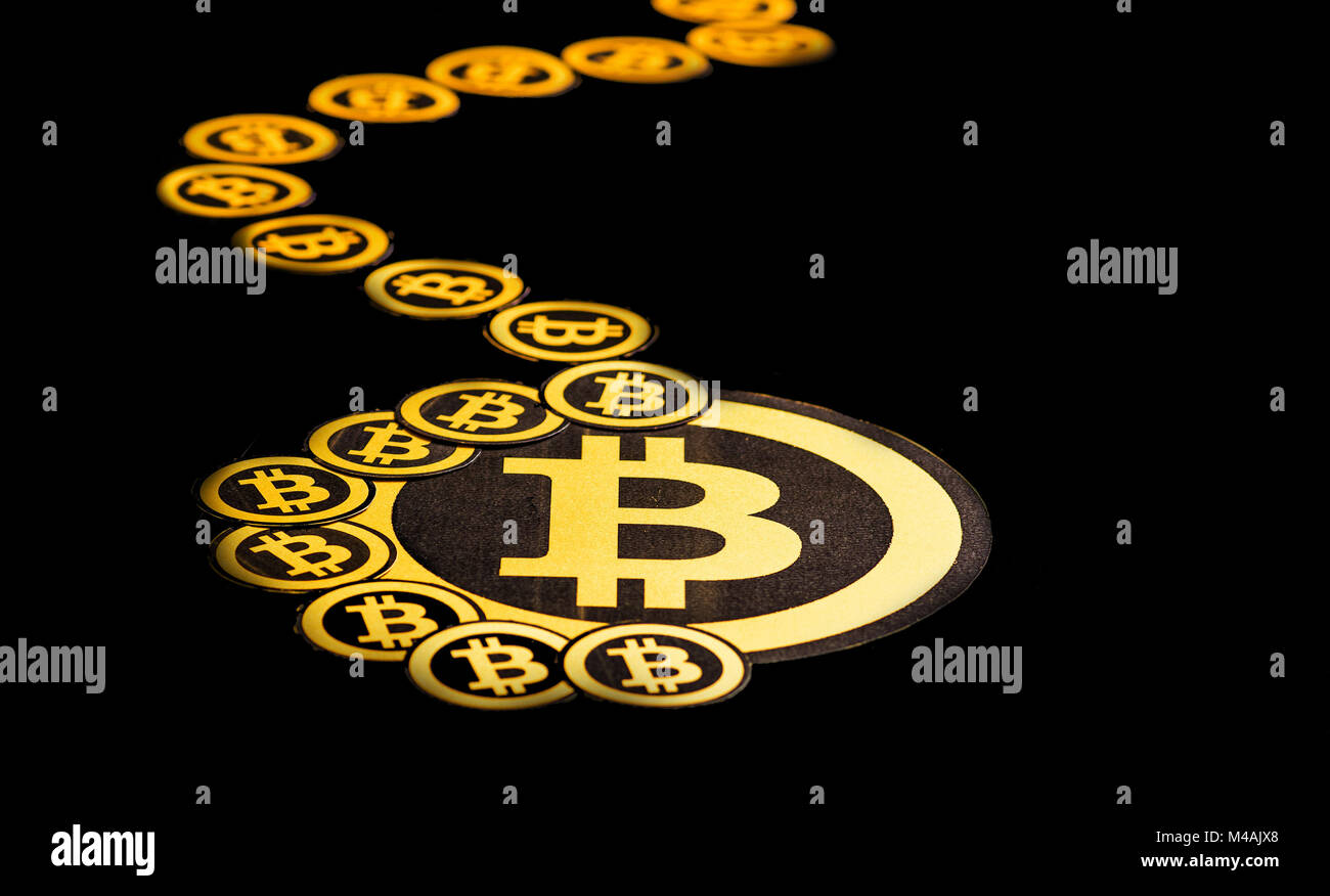 Quito, Ecuador - January 31, 2018: Close up of Golden Bitcoin logo ...