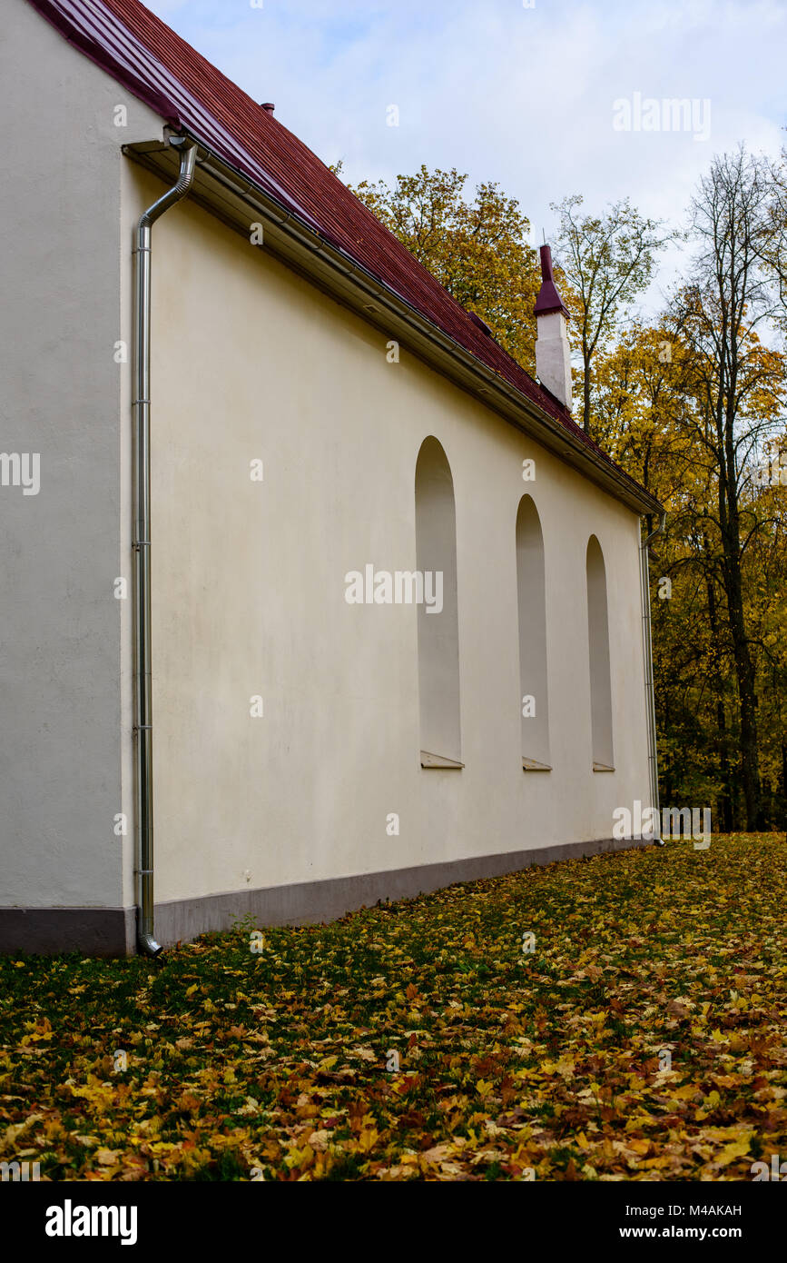 country house with oak trees in autumn colors Stock Photo - Alamy