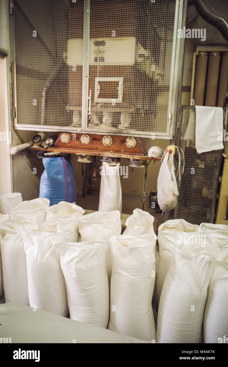 Production of genuine wheat flour in an ancient mill in Erchie, Puglia ...