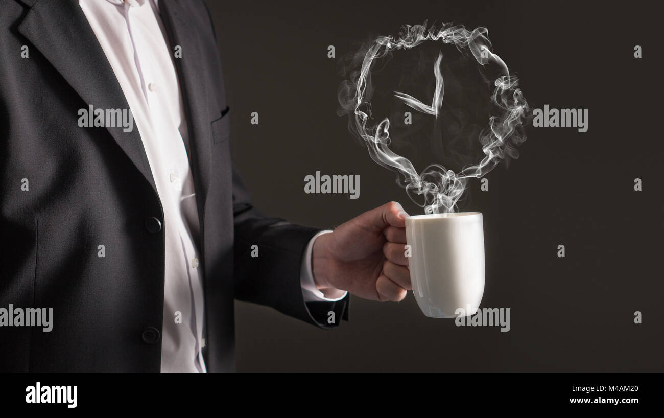 Coffee break concept. Clock sign from steam. Smoke forming a time ...