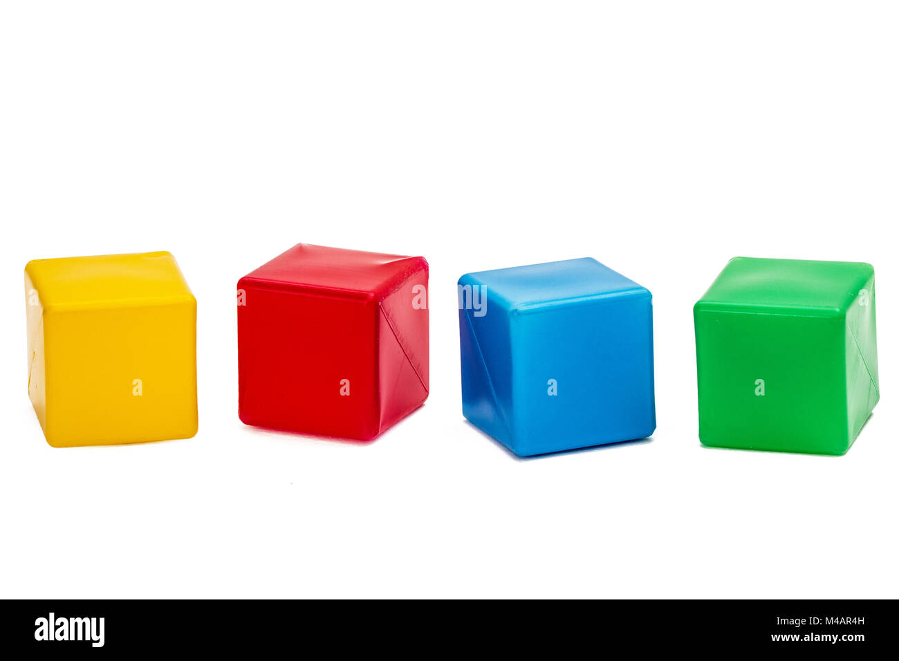 Bright colored childrens cubes, isolated on white background Stock ...