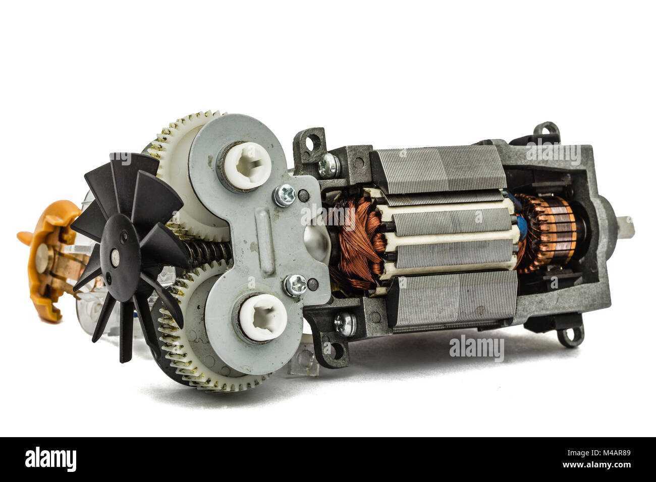 Small electric motor with fan, isolated on white background Stock Photo ...