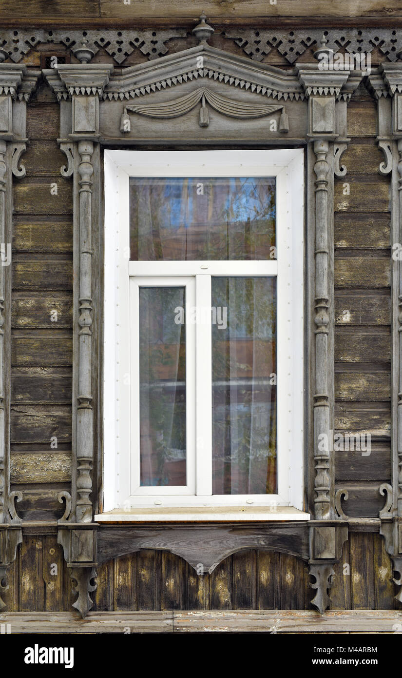 Wooden decorating of windows old residential buildings Stock Photo - Alamy