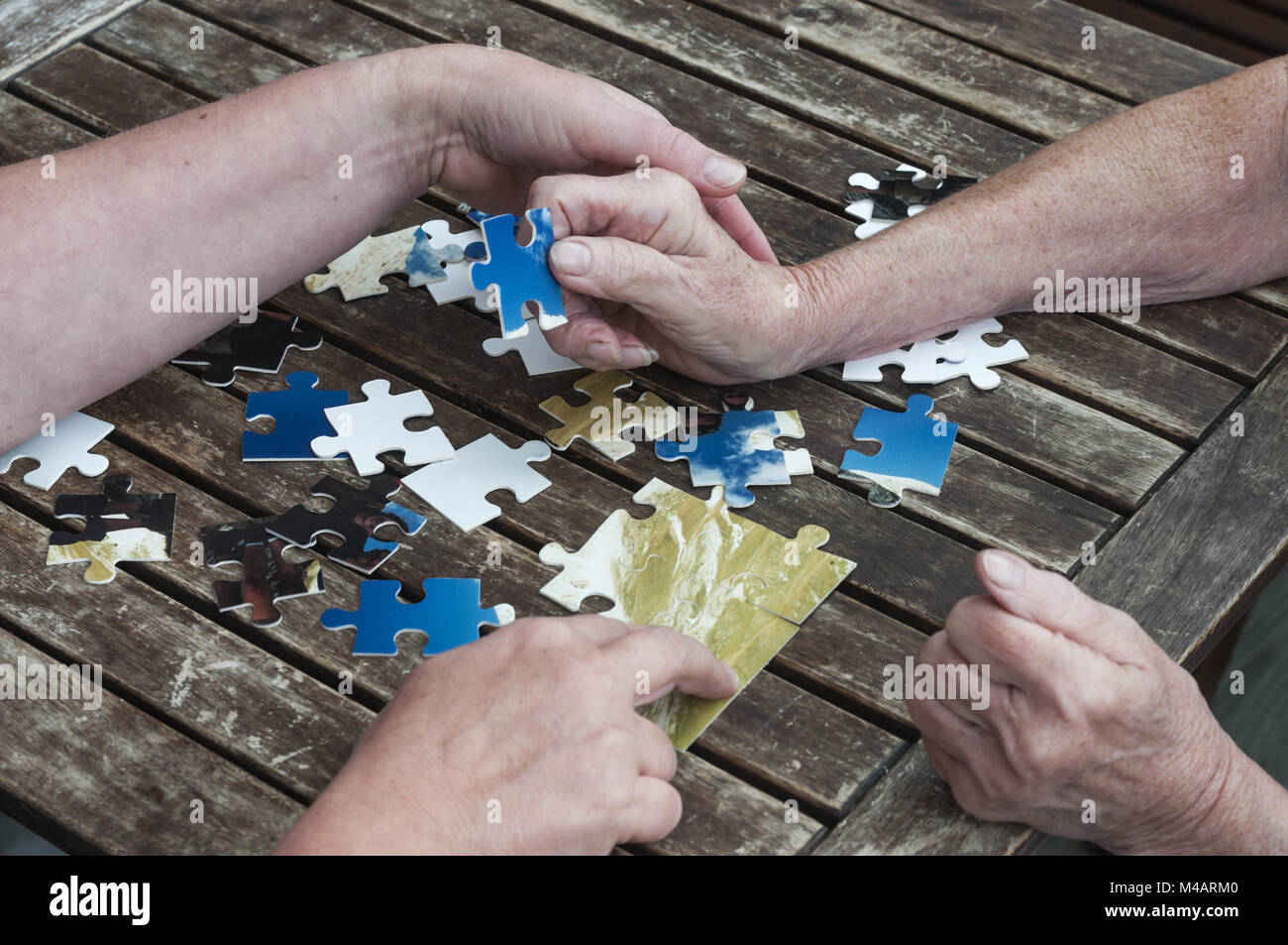 Senior puzzle hi-res stock photography and images - Alamy