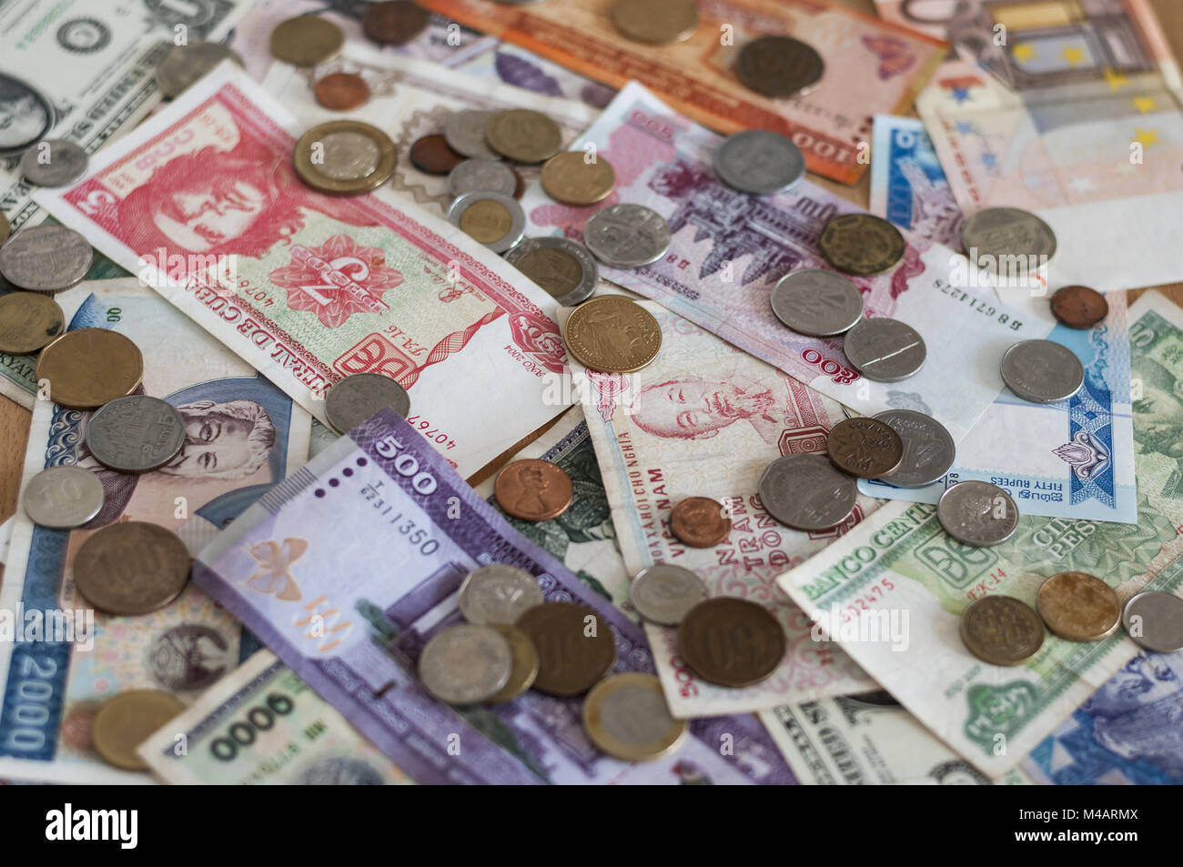 Banknotes and Coins Stock Photo - Alamy