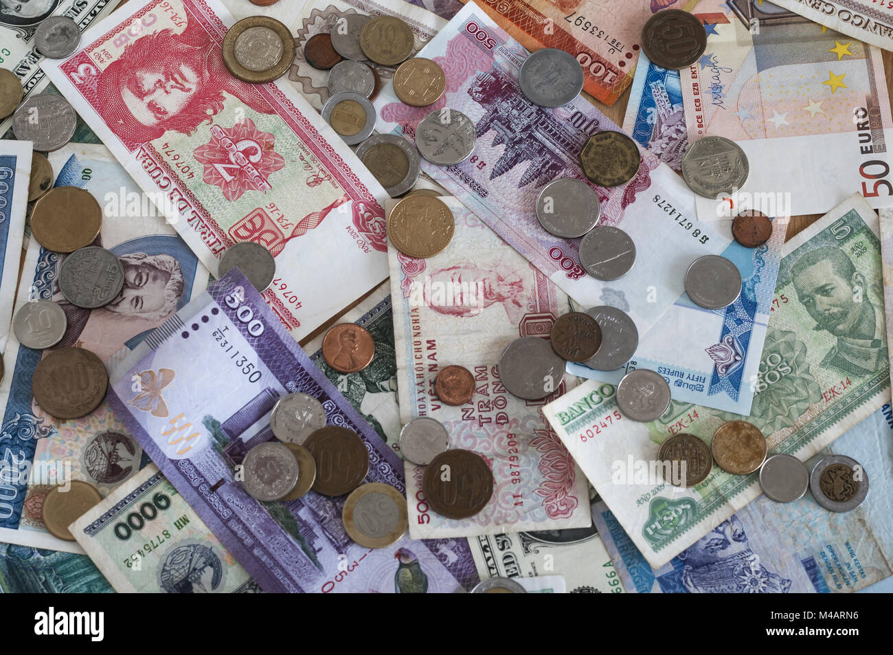 Banknotes and Coins Stock Photo - Alamy