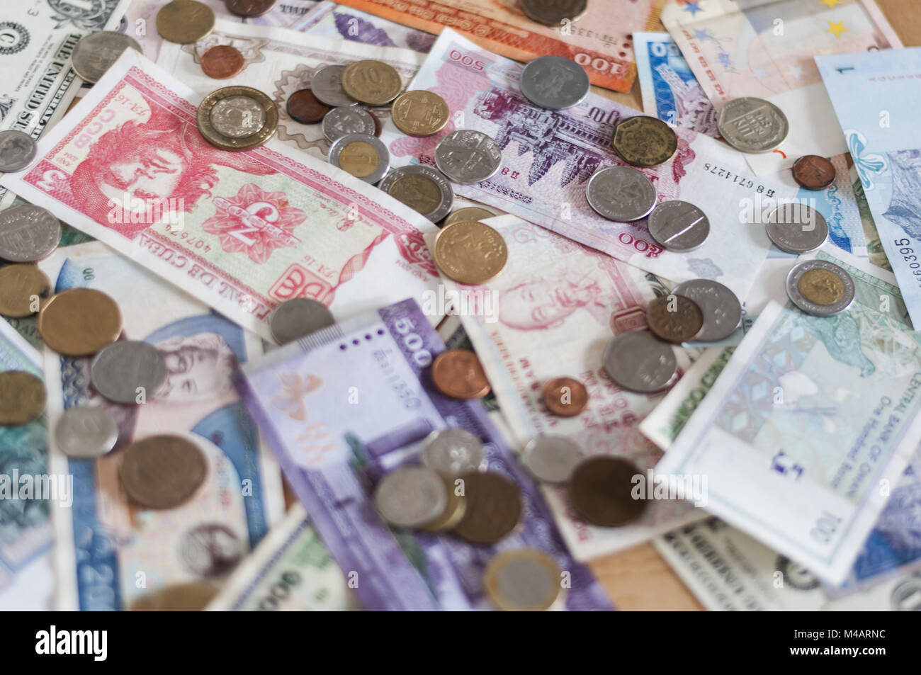 Banknotes and Coins Stock Photo - Alamy