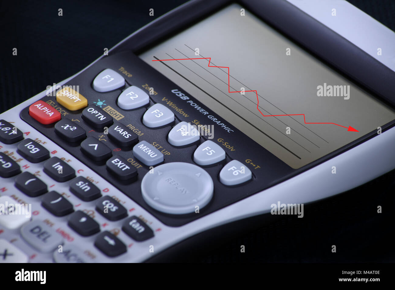 Calculator with graph Stock Photo - Alamy