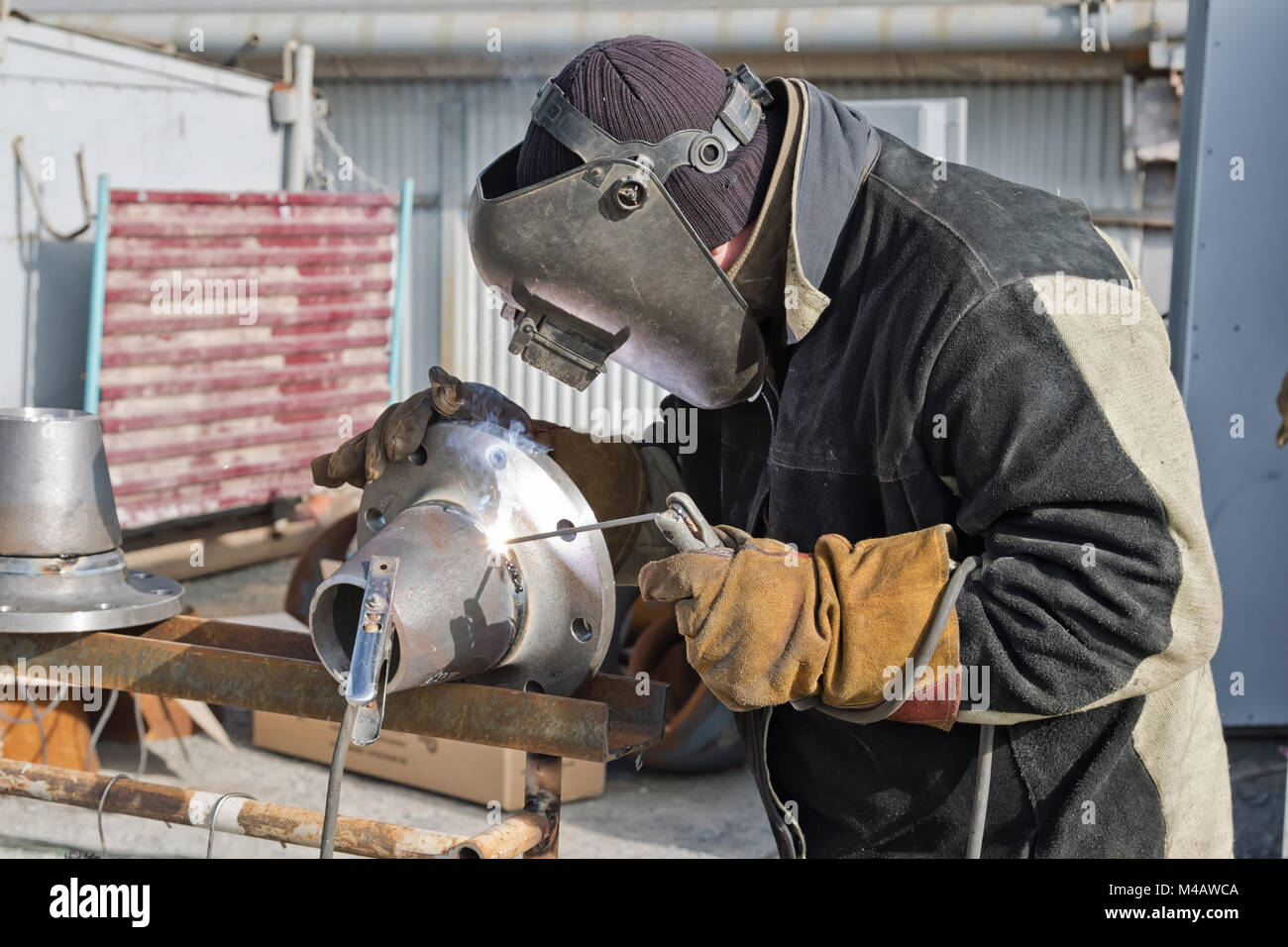 Welding works on manufacturing of units and parts of pipelines Stock ...