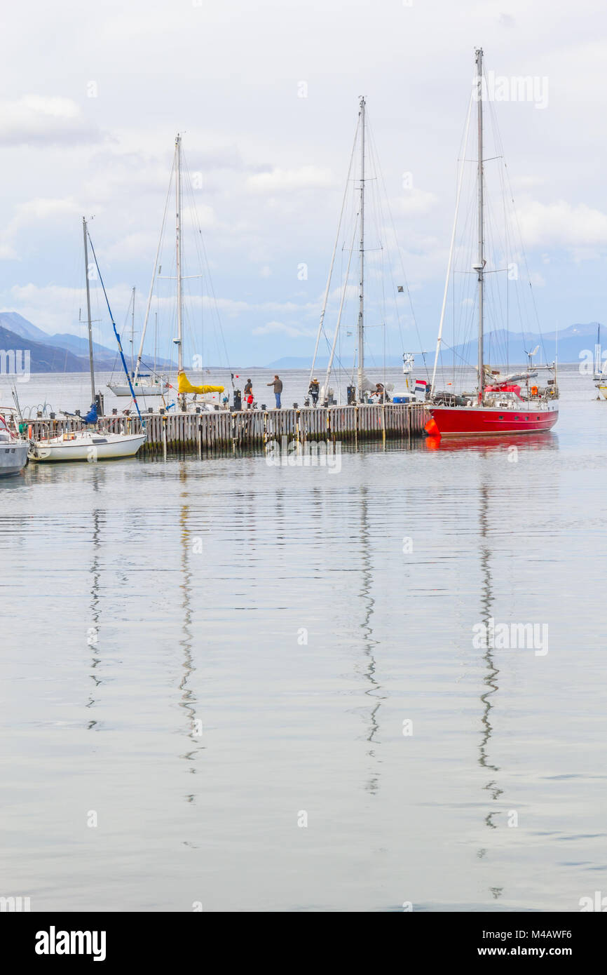 Boats in Beagle channel with mountains in Ushuaia, Patagonia, Argentina ...