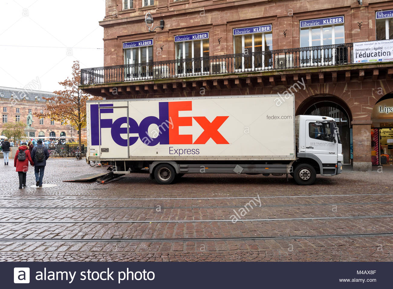 Unloading Delivery Truck Stock Photos & Unloading Delivery Truck Stock ...
