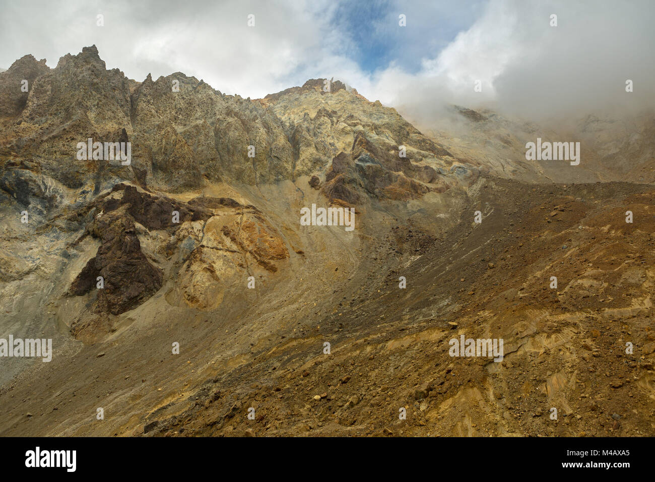 Beautiful slopes Mutnovsky volcano shrouded in clouds Stock Photo - Alamy
