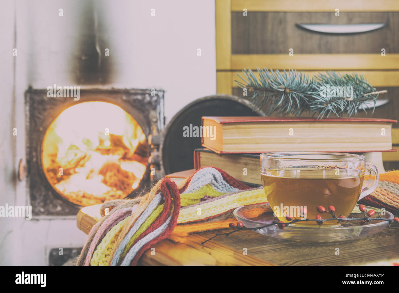 Cup of tea and flames of fire in a fireplace Stock Photo - Alamy