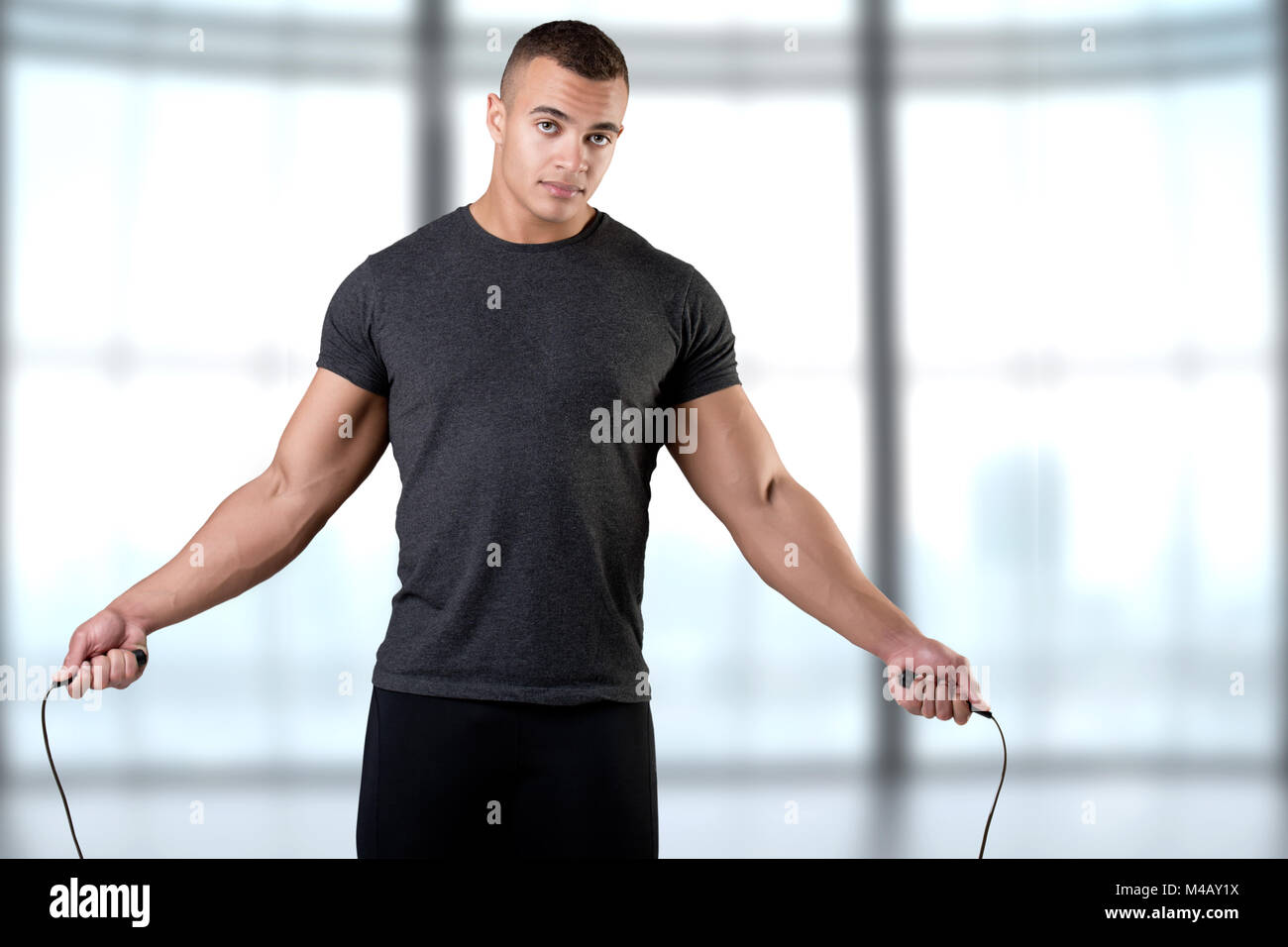 Muscular man skipping rope hi-res stock photography and images - Alamy