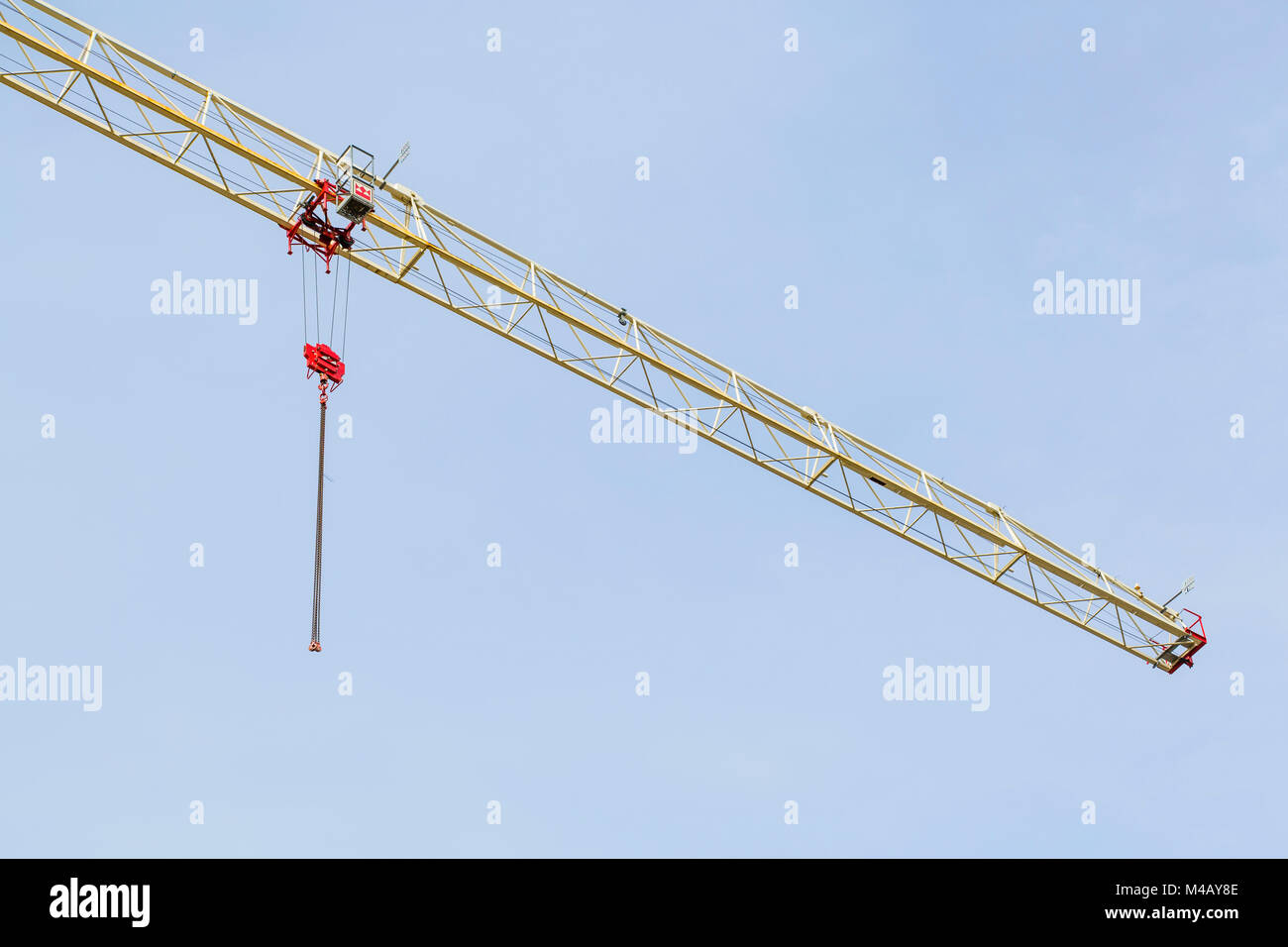 Tower crane jib against a blue sky, UK Stock Photo - Alamy