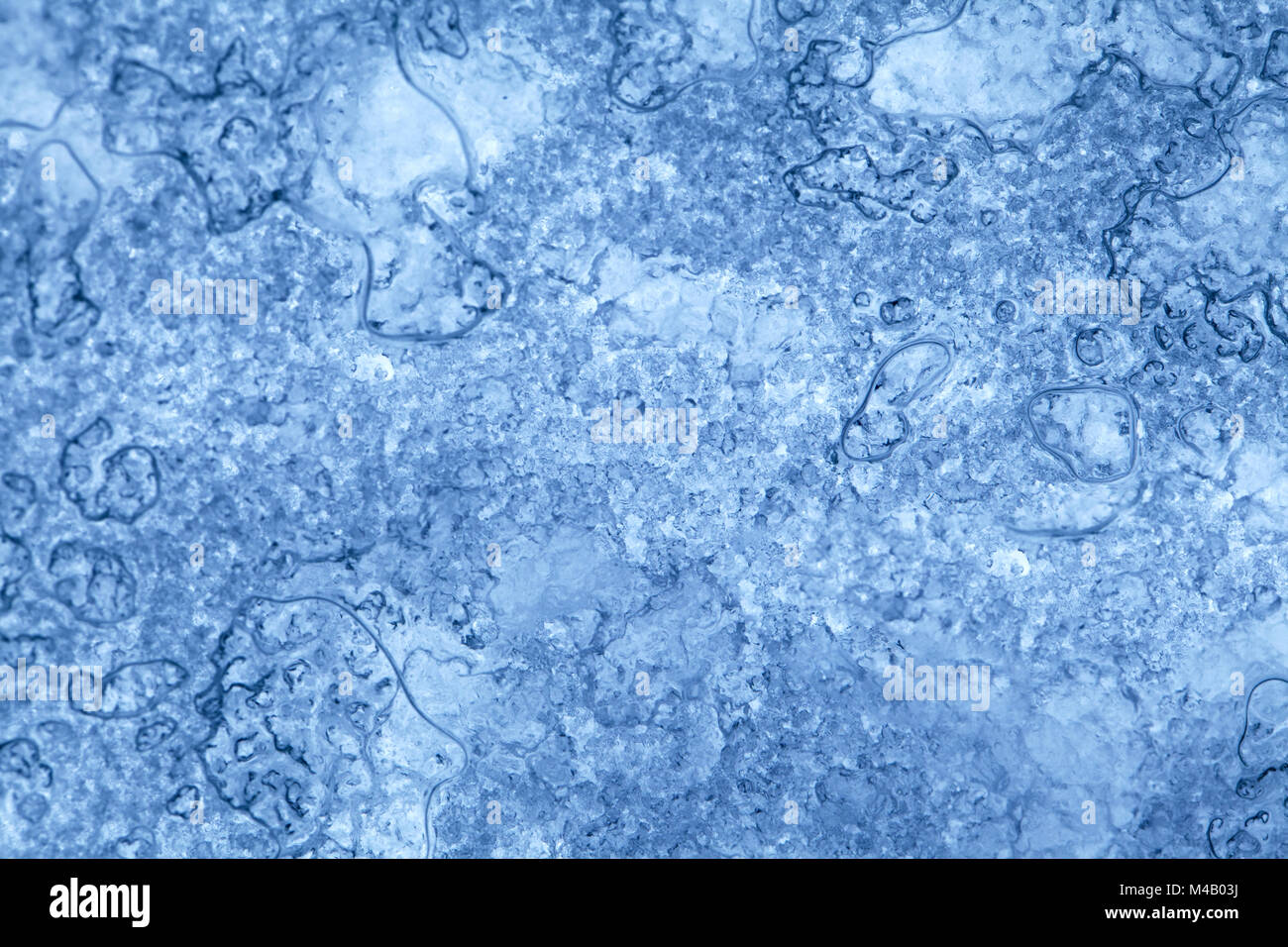 Melting ice background Stock Photo - Alamy