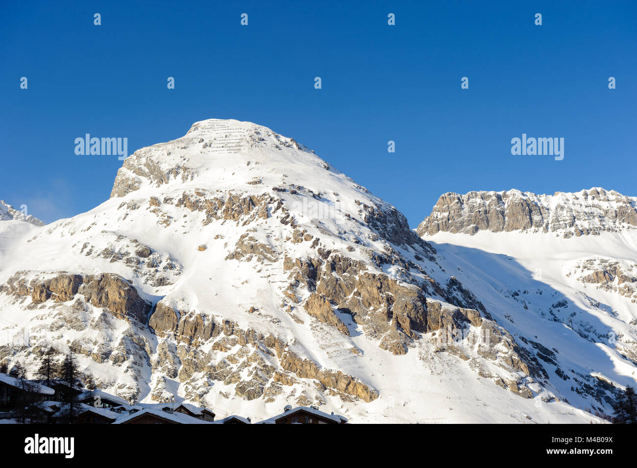 Alpine winter mountain landscape. French Alps with snow Stock Photo - Alamy