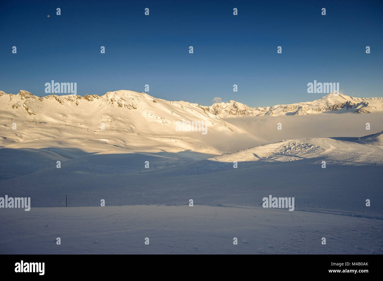 Alpine winter mountain landscape. French Alps with snow Stock Photo - Alamy
