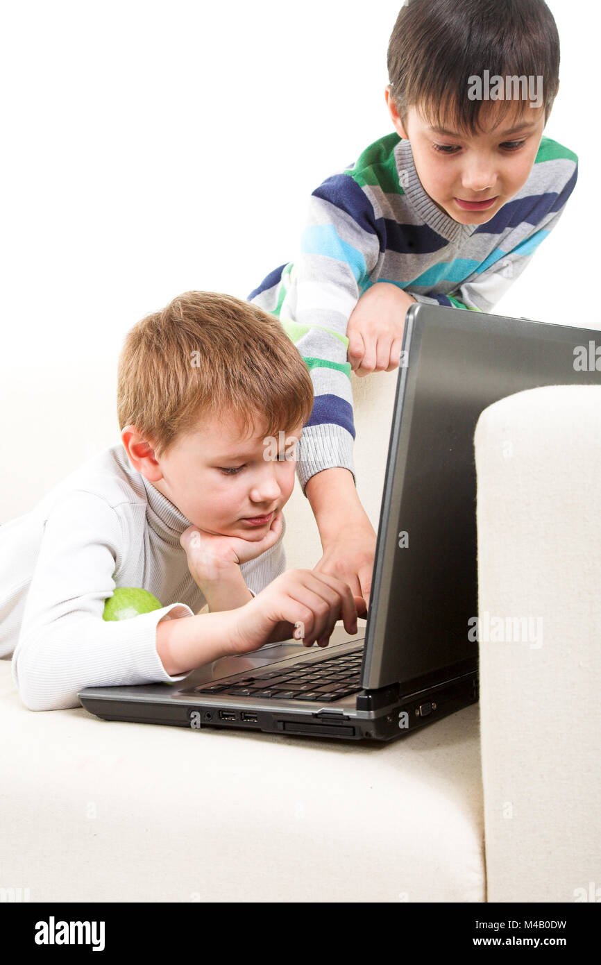 Two boys computer hi-res stock photography and images - Alamy