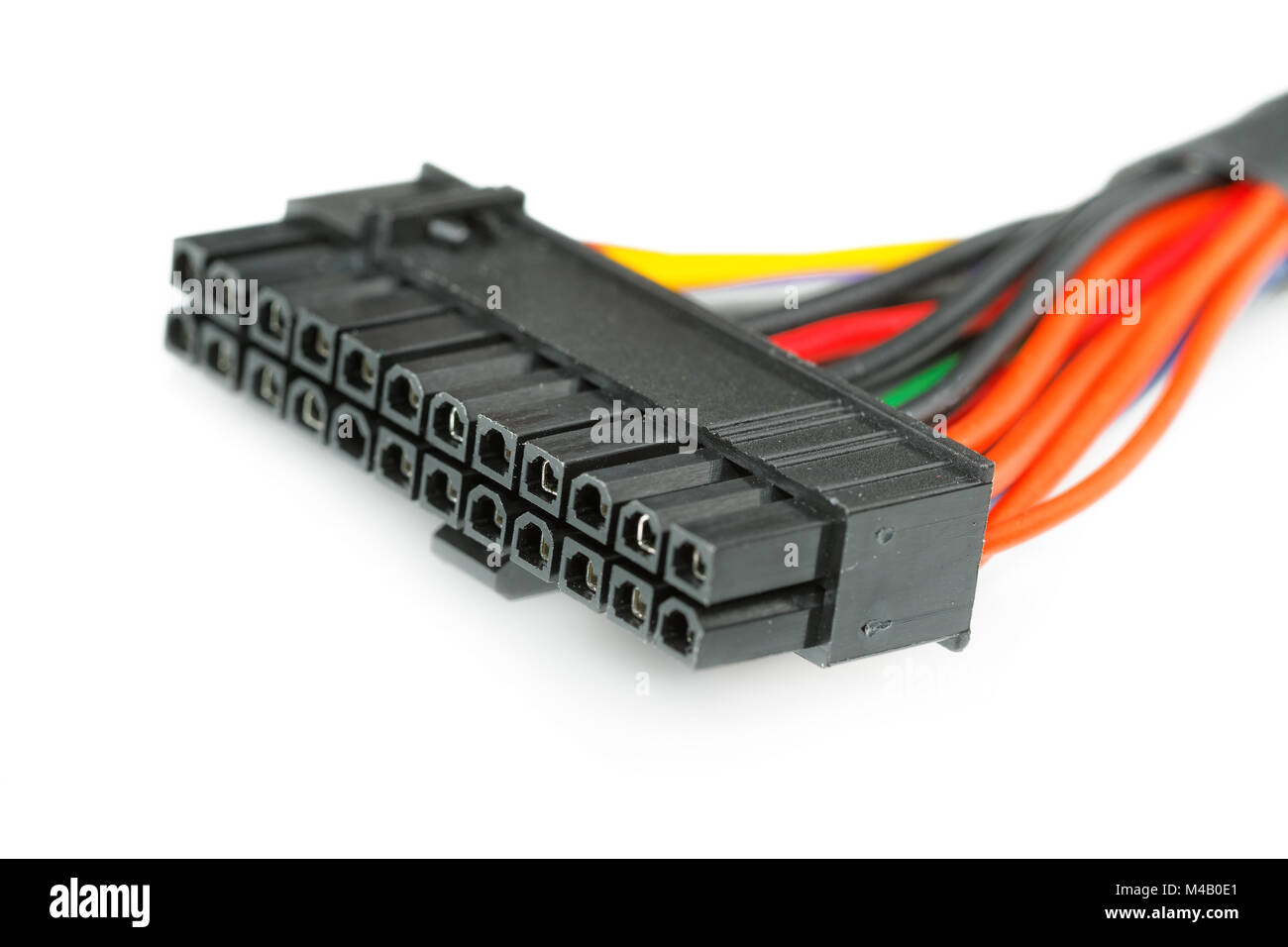 connecting wires to a computer on a white background Stock Photo - Alamy