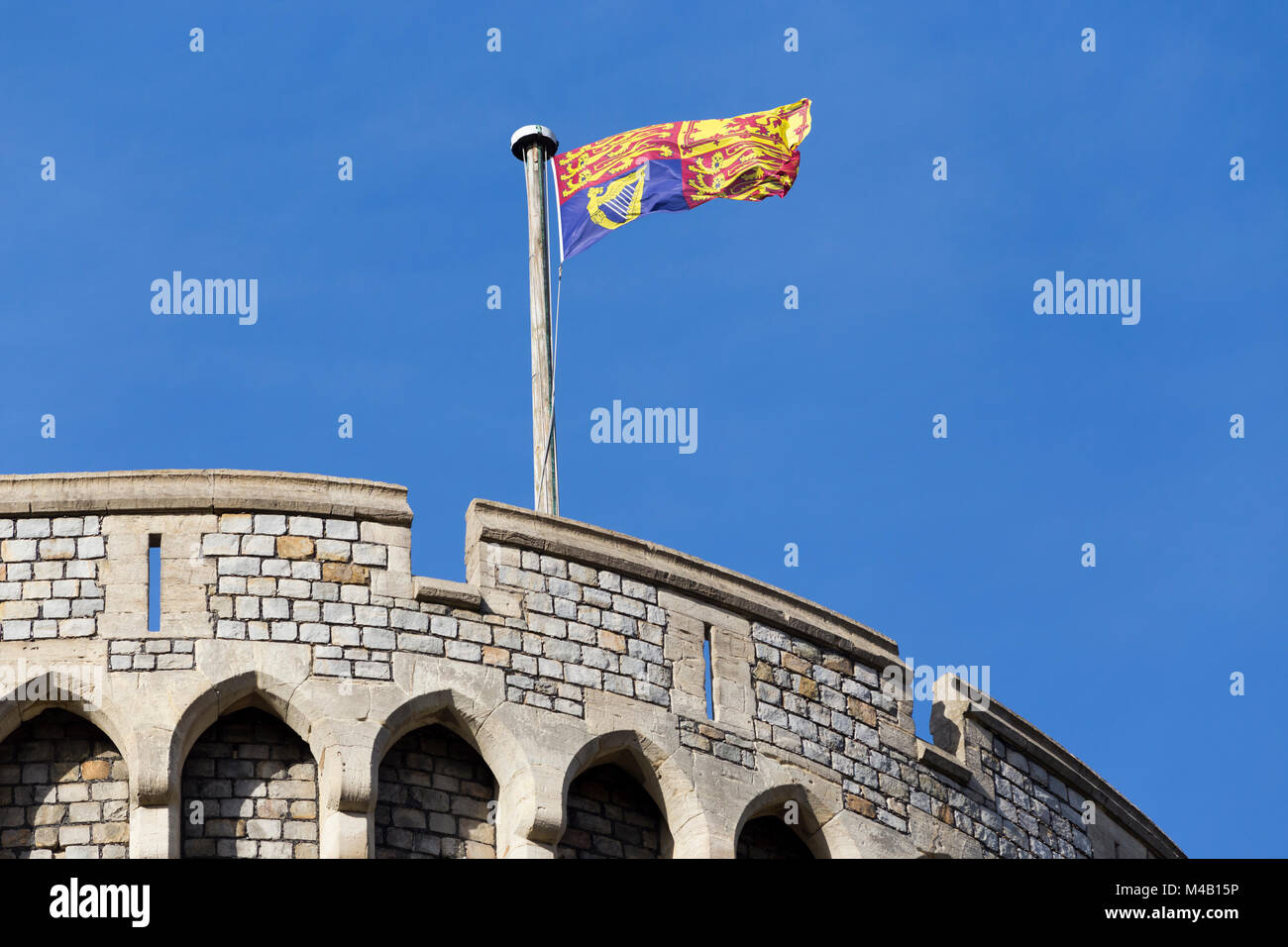 The Royal Standard flag flying on / from a flagpole / pole at Windsor ...