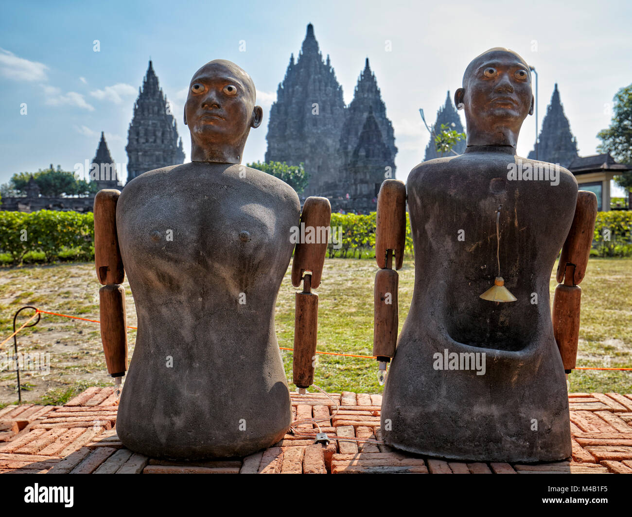 Statues at the entrance to the Prambanan Hindu Temple Compound. Special ...