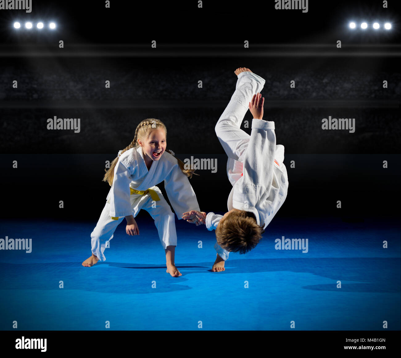 Children martial arts fighters in sports hall Stock Photo - Alamy