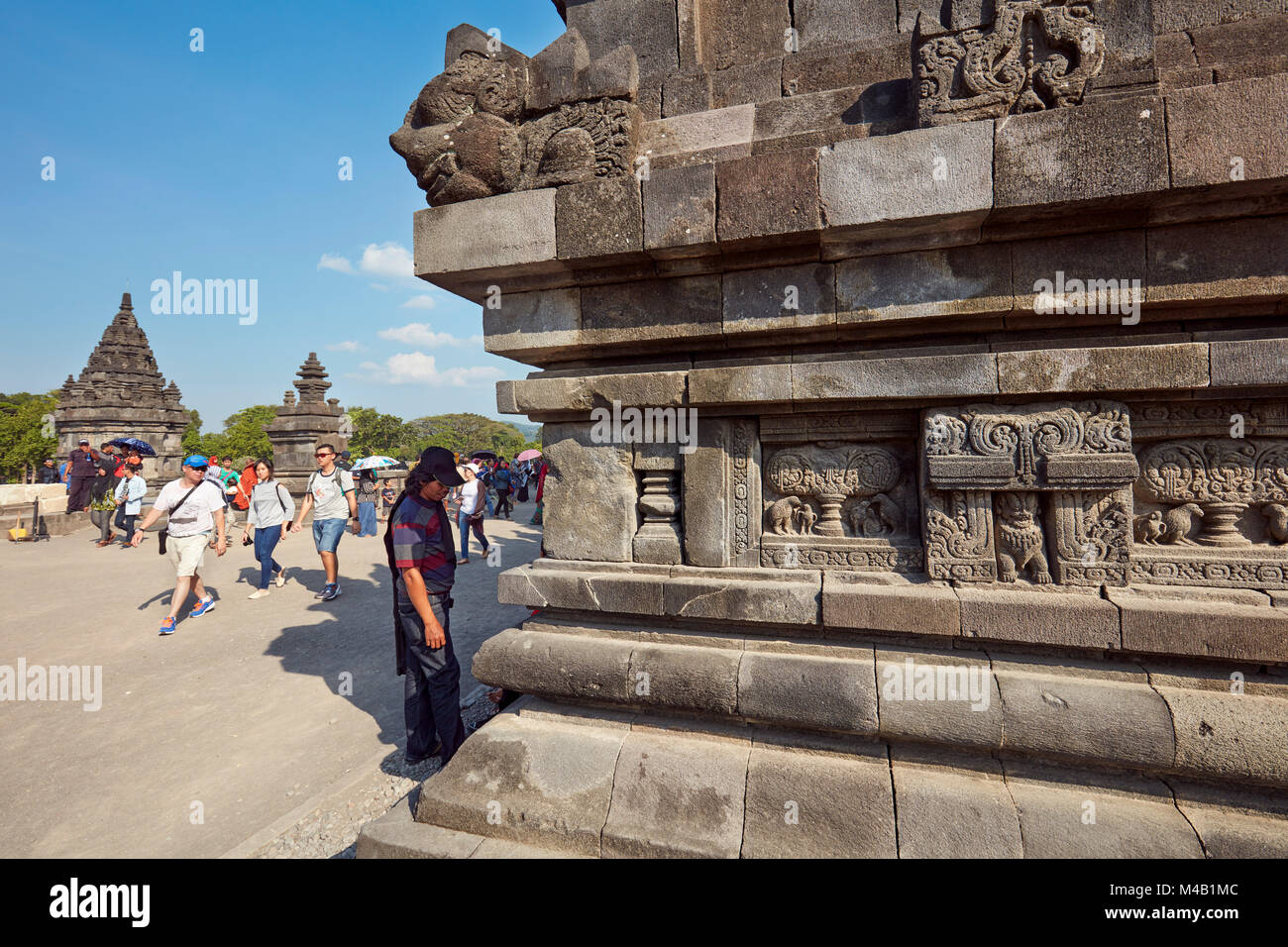 Stone carvings on a tower base. Prambanan Hindu Temple Compound ...