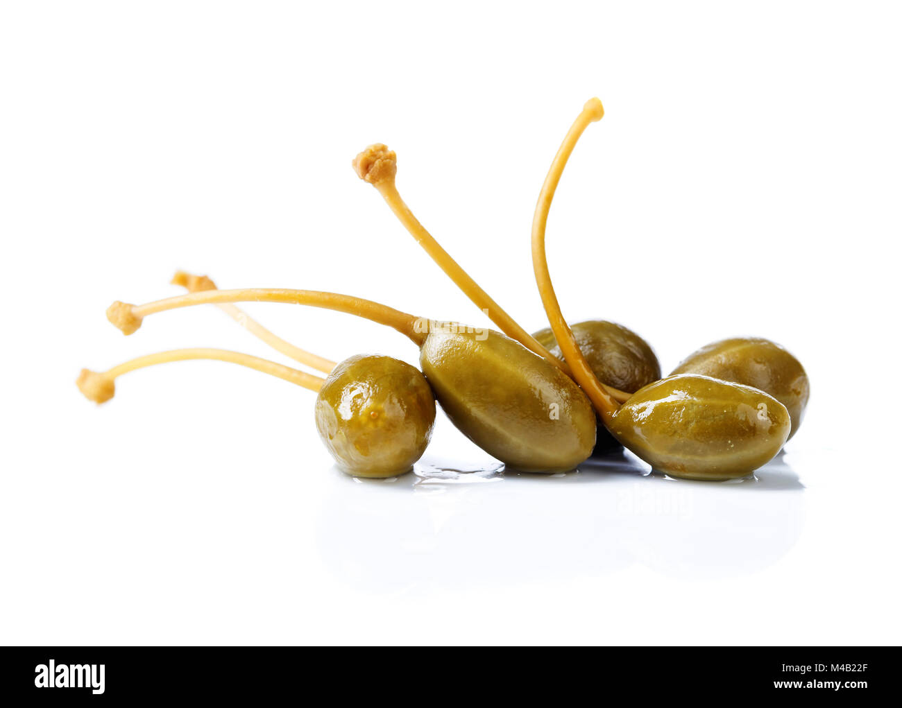 Pickled caper berries isolated on white background . Edible fruits of ...