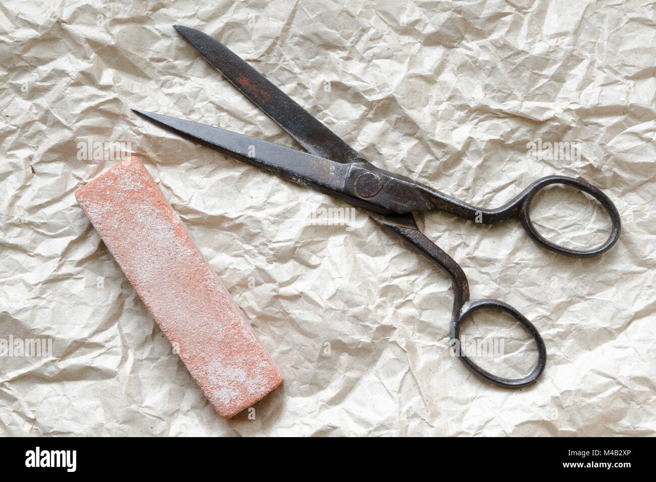 grindstone and scissors Stock Photo - Alamy