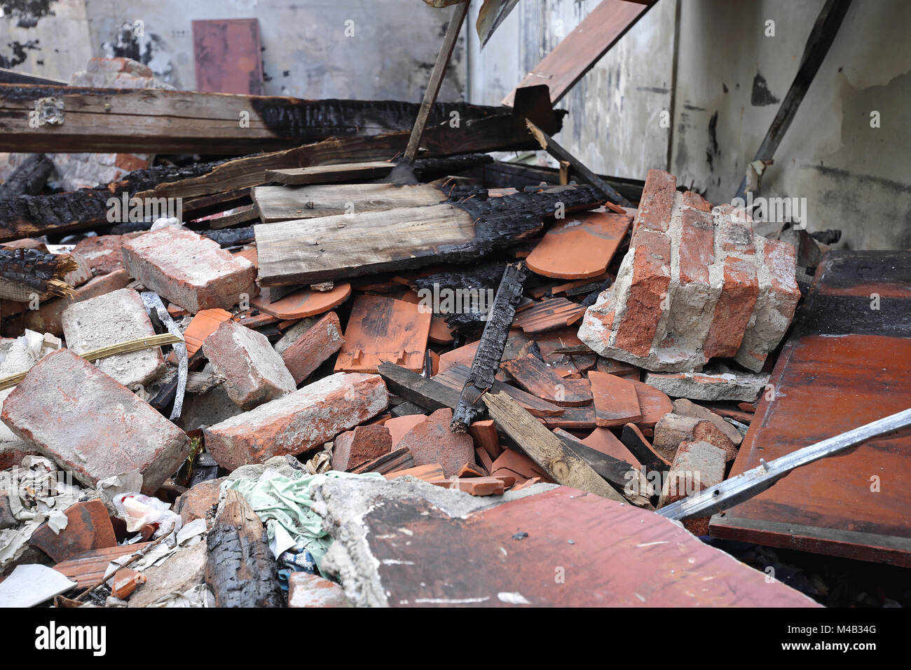 Collapsed Roof and Burned Wooden Structure in Factory After Fire ...