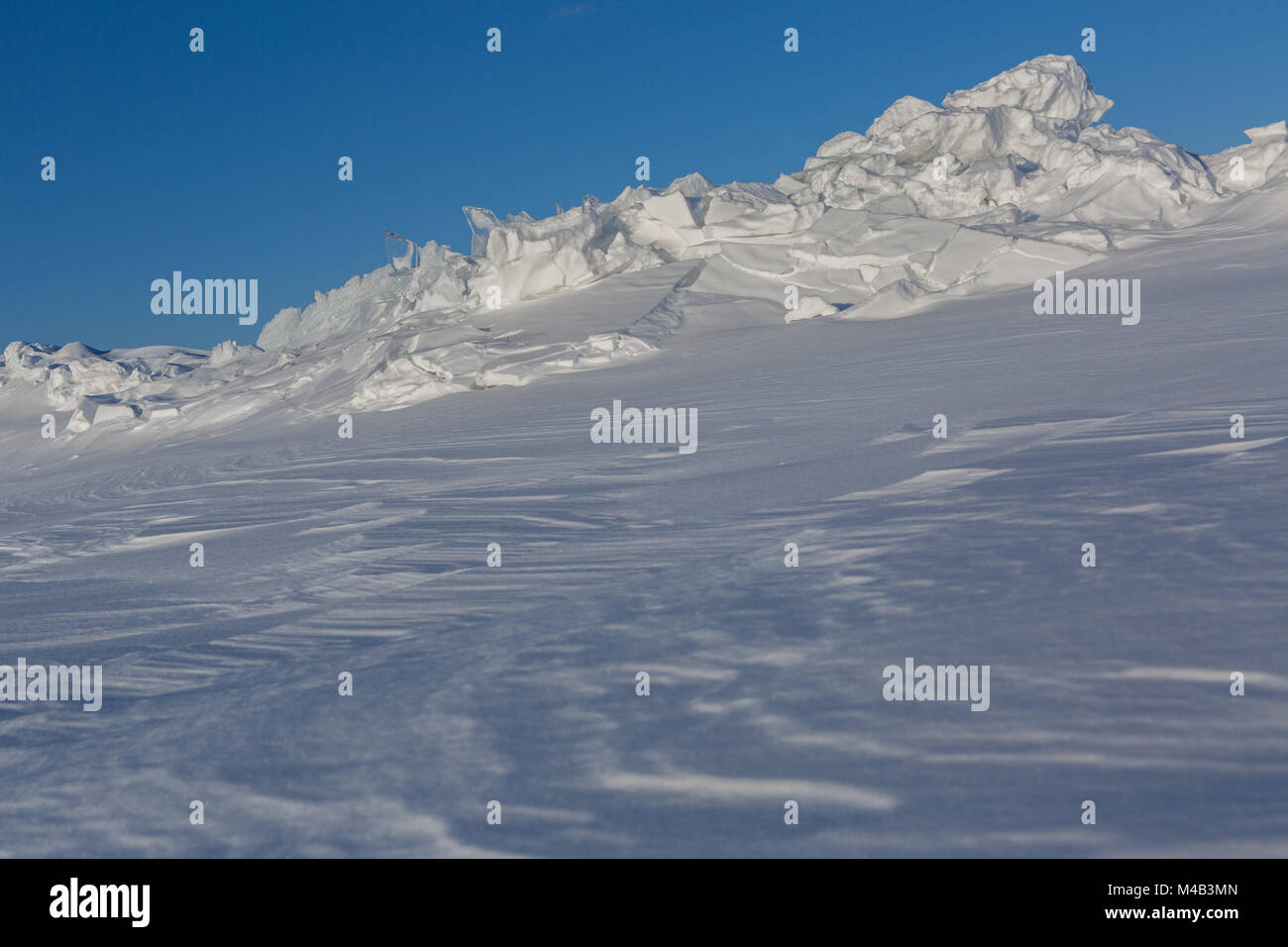Snow-covered ice hummocks of Lake Baikal Stock Photo - Alamy