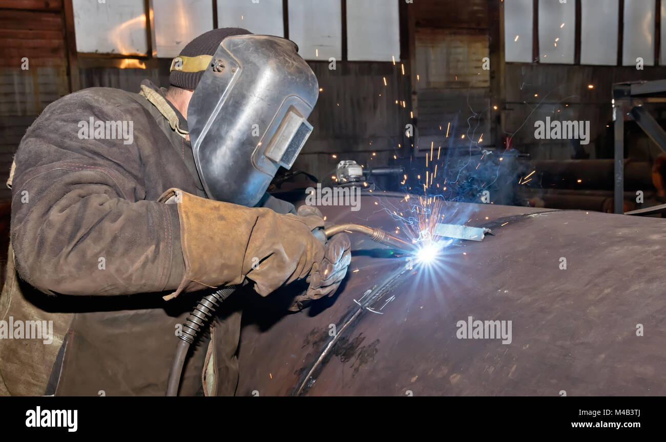 Repair of parts of the apparatus for manual arc welding Stock Photo - Alamy