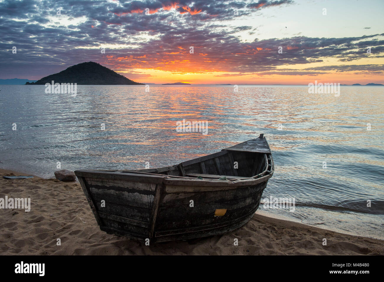 Fishing boat at sunset at Lake Malawi,Cape Maclear,Malawi,Africa Stock ...