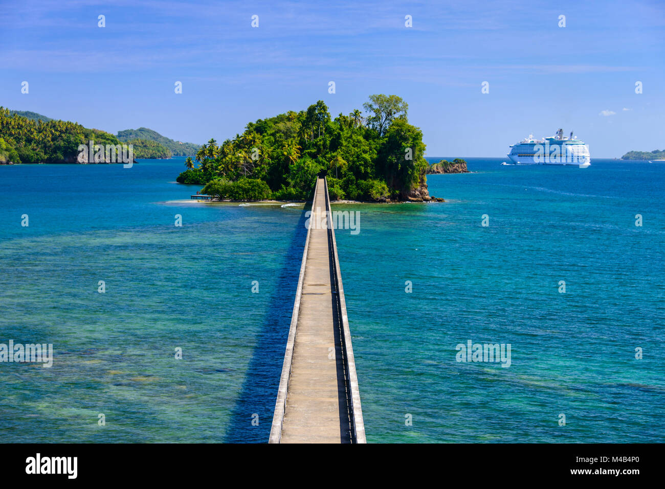Long pedestrian bridge leading to a little islet,Santa Barbara de ...