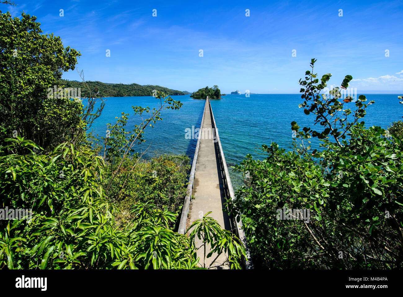 Long pedestrian bridge leading to a little islet,Santa Barbara de ...