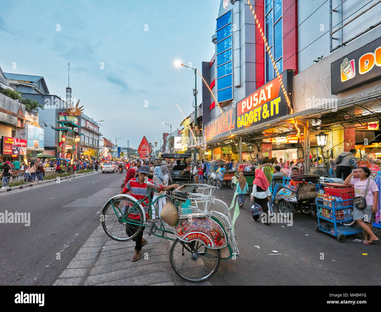 Malioboro Street illuminated at dusk. Yogyakarta, Java, Indonesia Stock ...