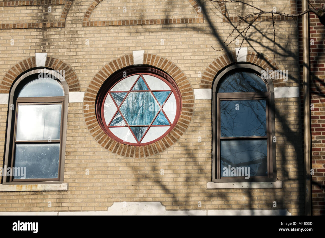 Glass window with jewish penthagram Stock Photo - Alamy