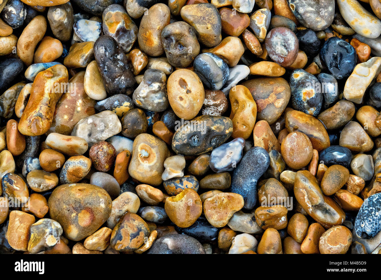 Pile of peebles on the beach Stock Photo - Alamy