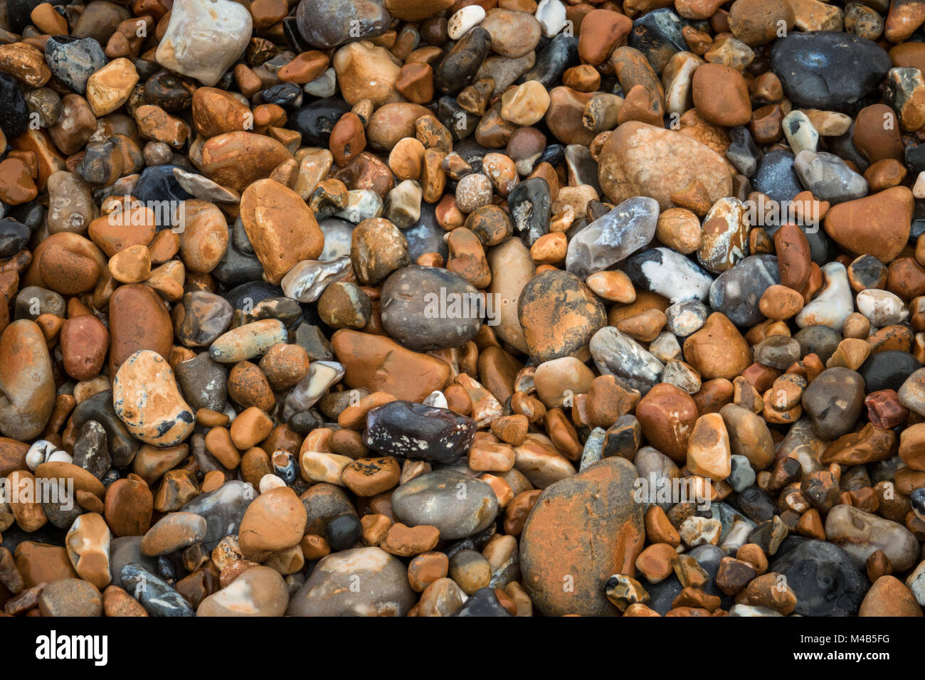 Pile of peebles on the beach Stock Photo - Alamy