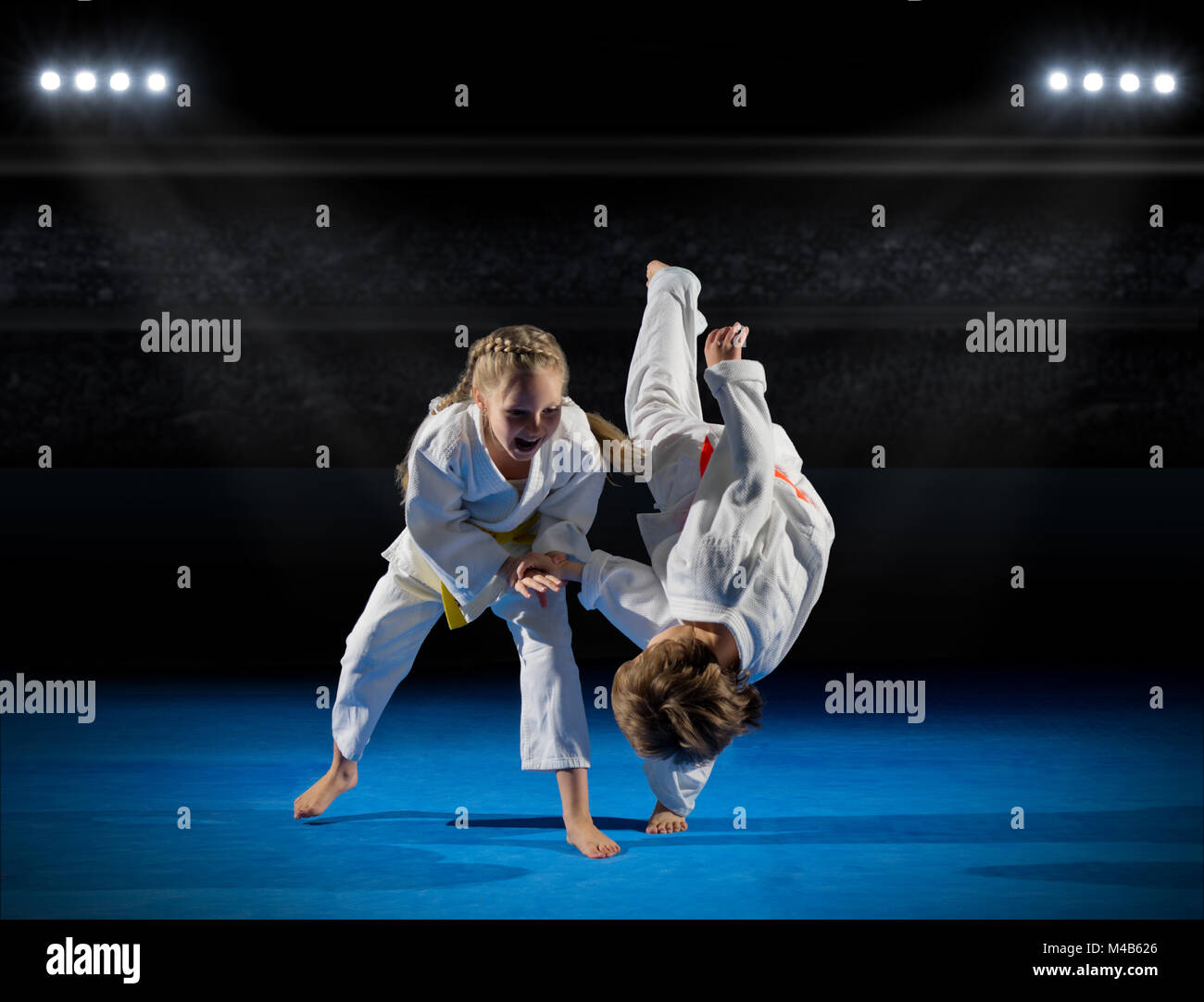 Children martial arts fighters in sports hall Stock Photo - Alamy