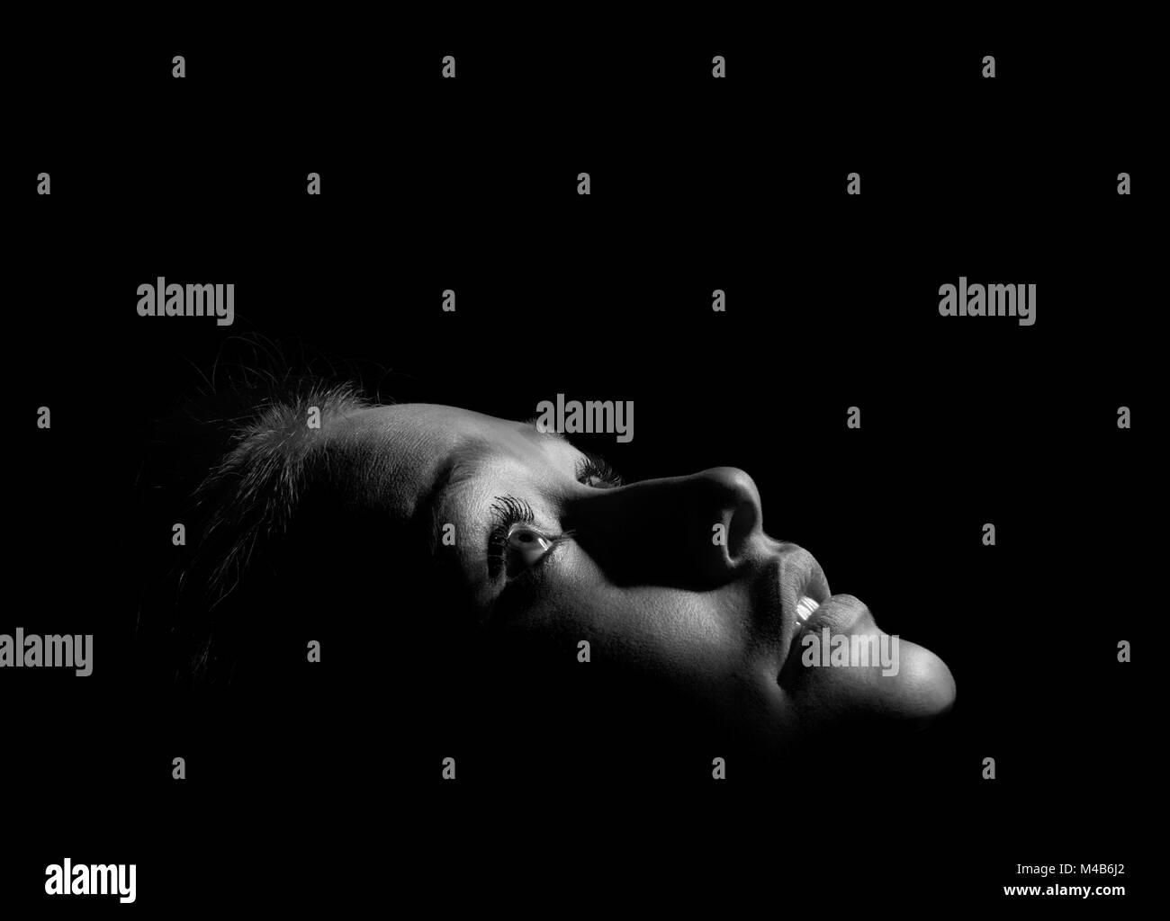 Woman face contrast profile shadow hi-res stock photography and images ...