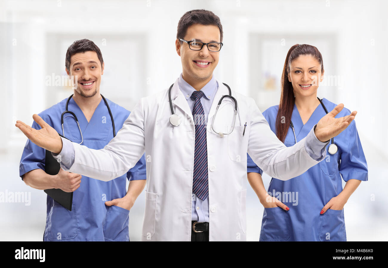 Medical team consisted of two male doctors and a female doctor Stock ...