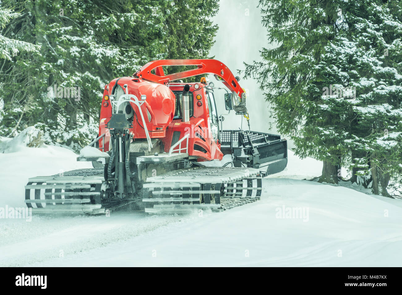 Modern tracked snow groomer Stock Photo - Alamy